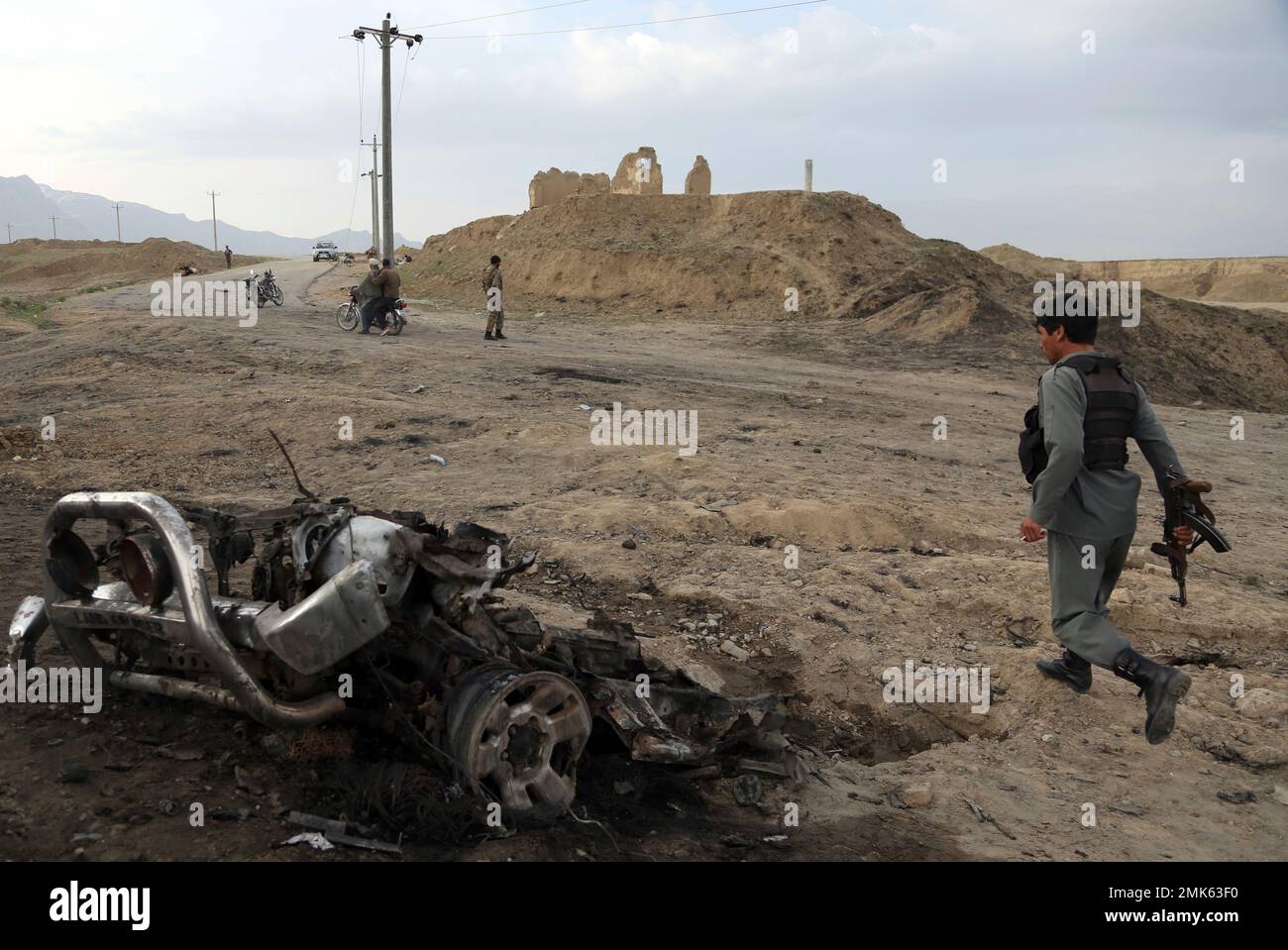 Afghan security forces gather at the site of Monday's attack near the ...