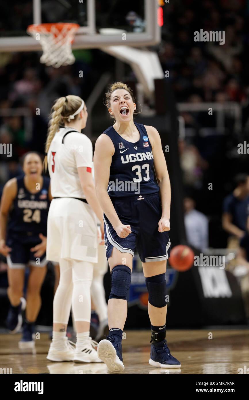 Connecticut guard Katie Lou Samuelson (33) reacts after hitting a three ...