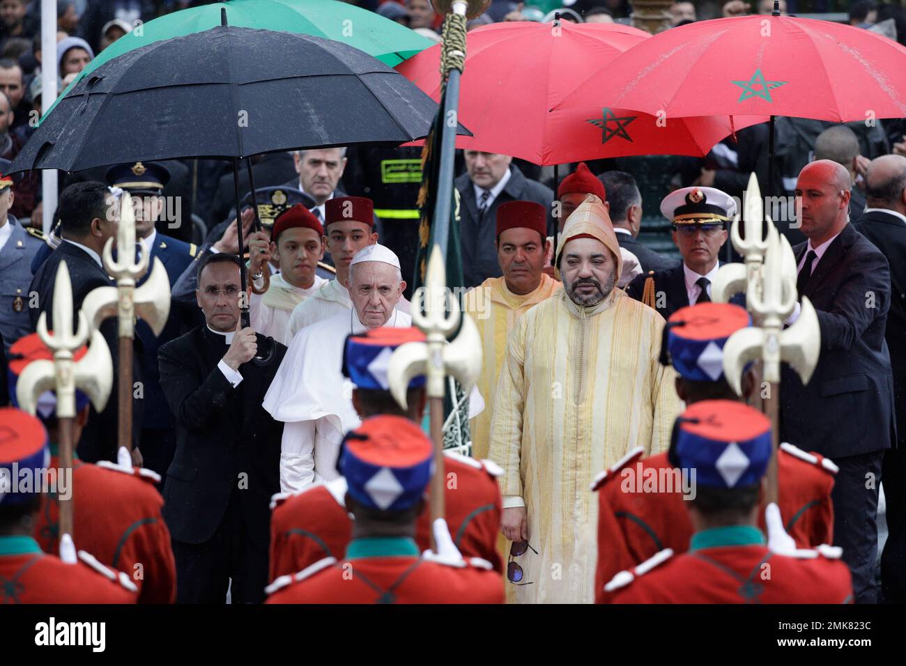 Pope Francis is flanked by Moroccan King Mohammed VI, in Rabat, Morocco ...