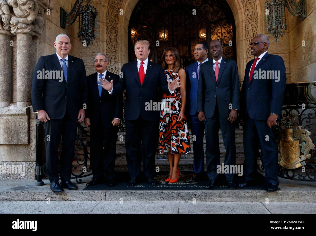 President Donald Trump and first lady Melania Trump pose for media with ...