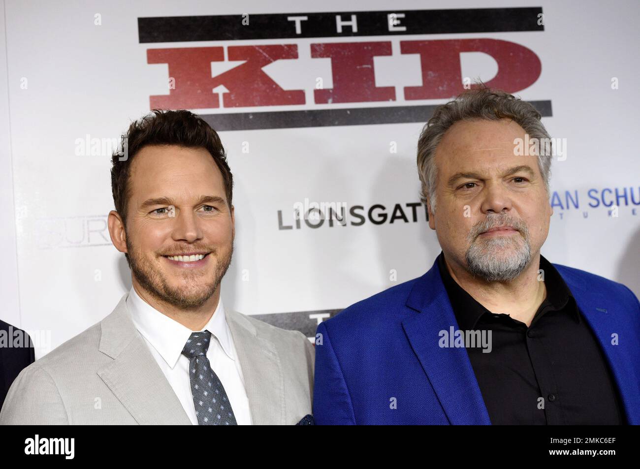 Chris Pratt, left, a cast member in "The Kid," poses with fellow cast member and director ...