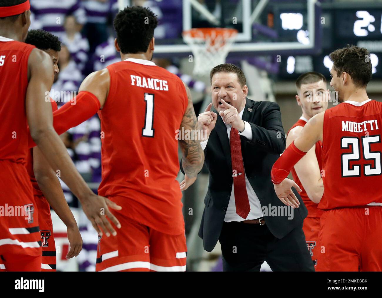 Texas Tech head coach Chris Beard, center, cheers on Tariq Owens (11 ...