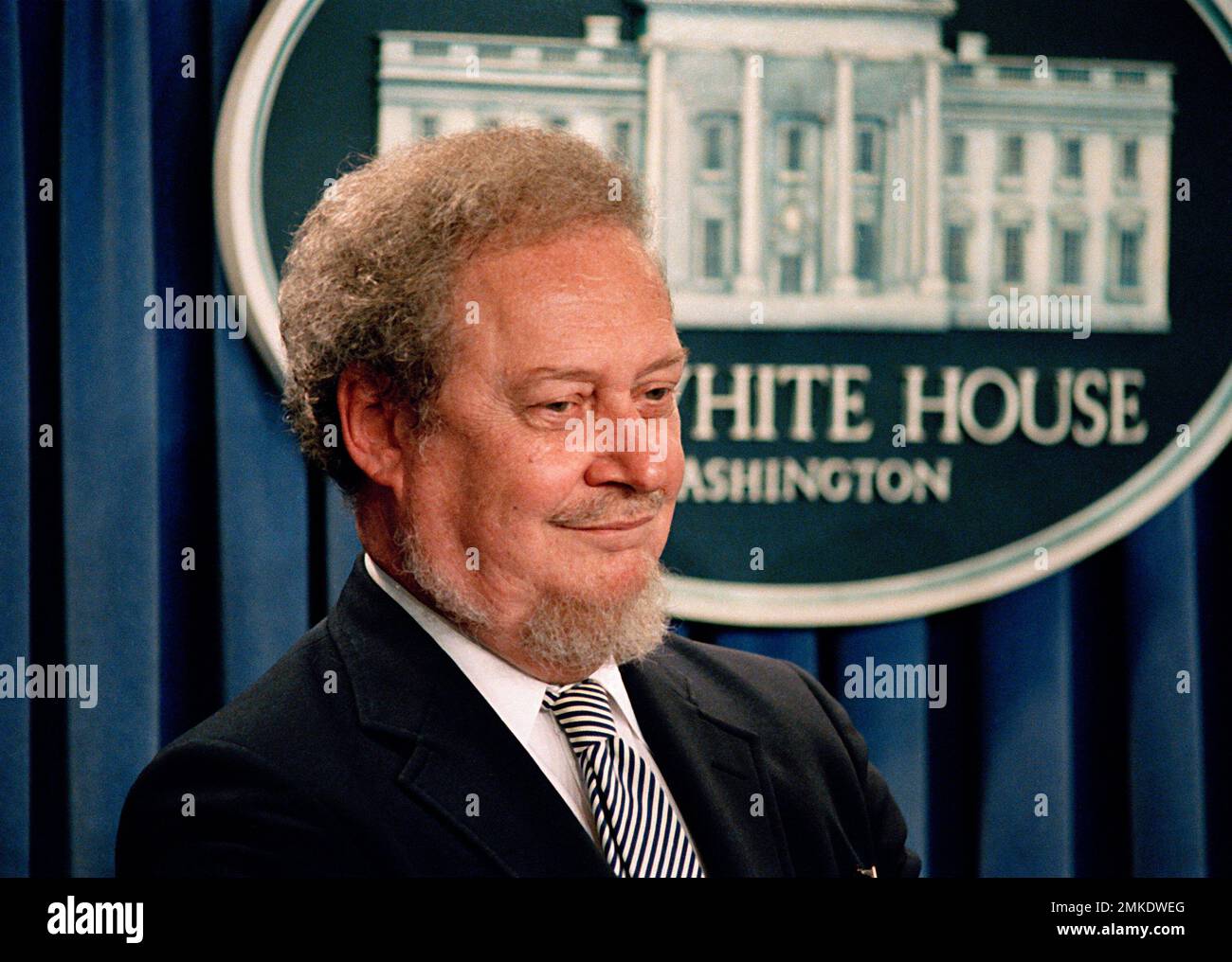 Appeals Court Judge Robert H. Bork listens as President Reagan ...