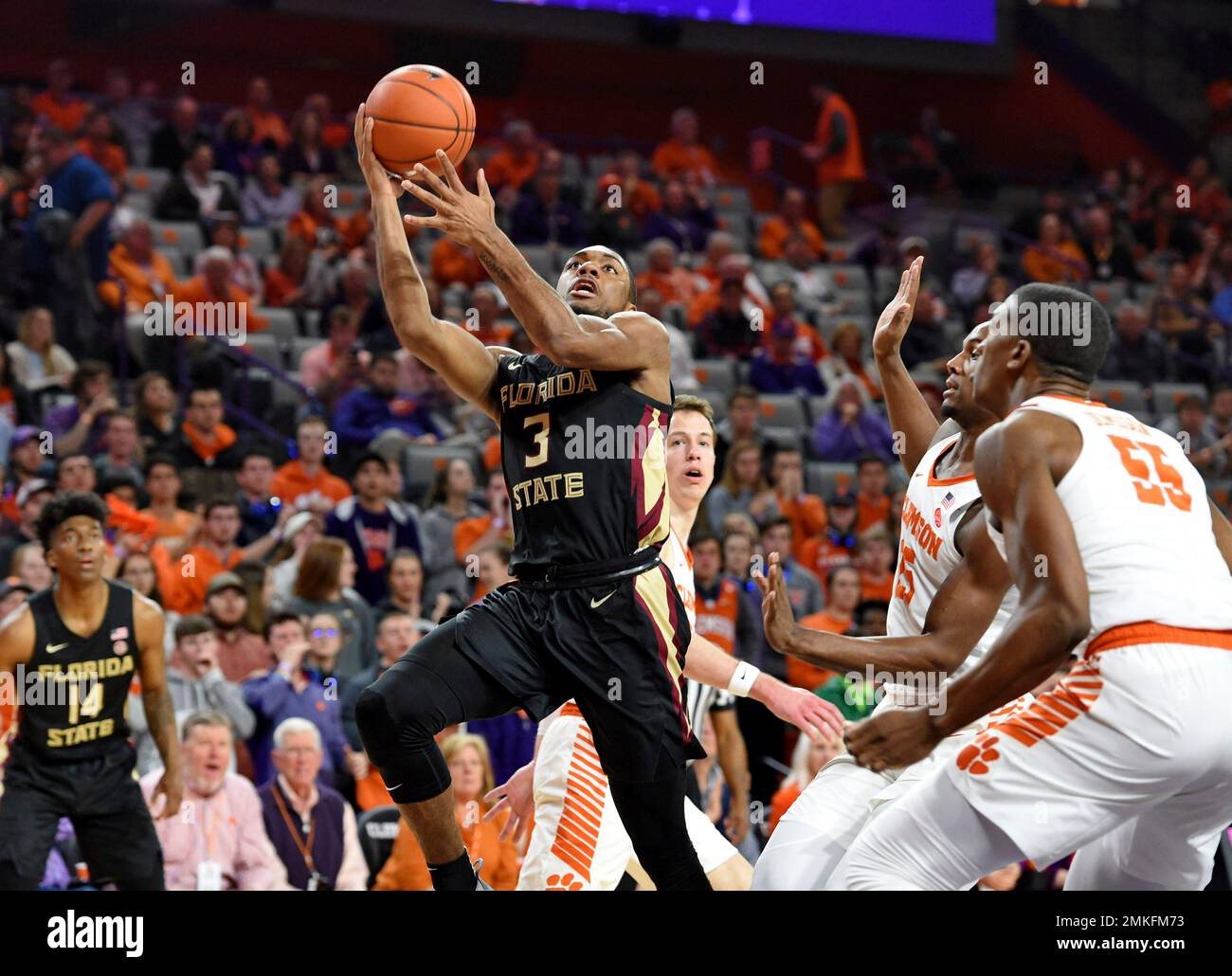 Florida State's Trent Forrest (3) drives to the basket while defended ...