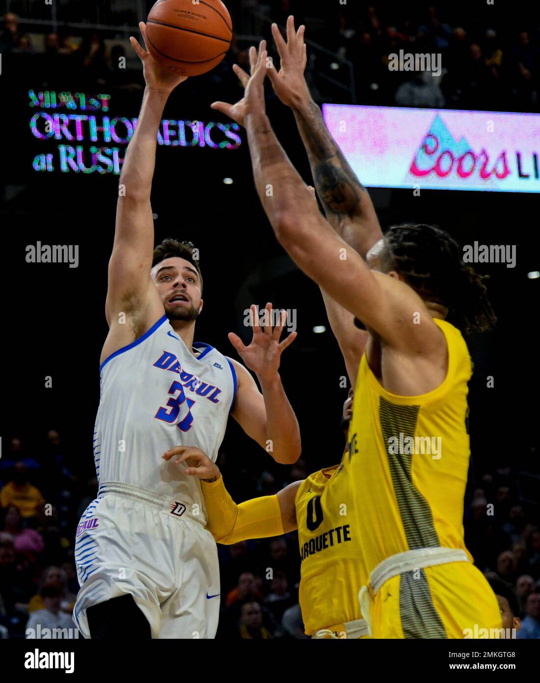 DePaul guard Max Strus (31) shoots against Marquette guard Markus ...