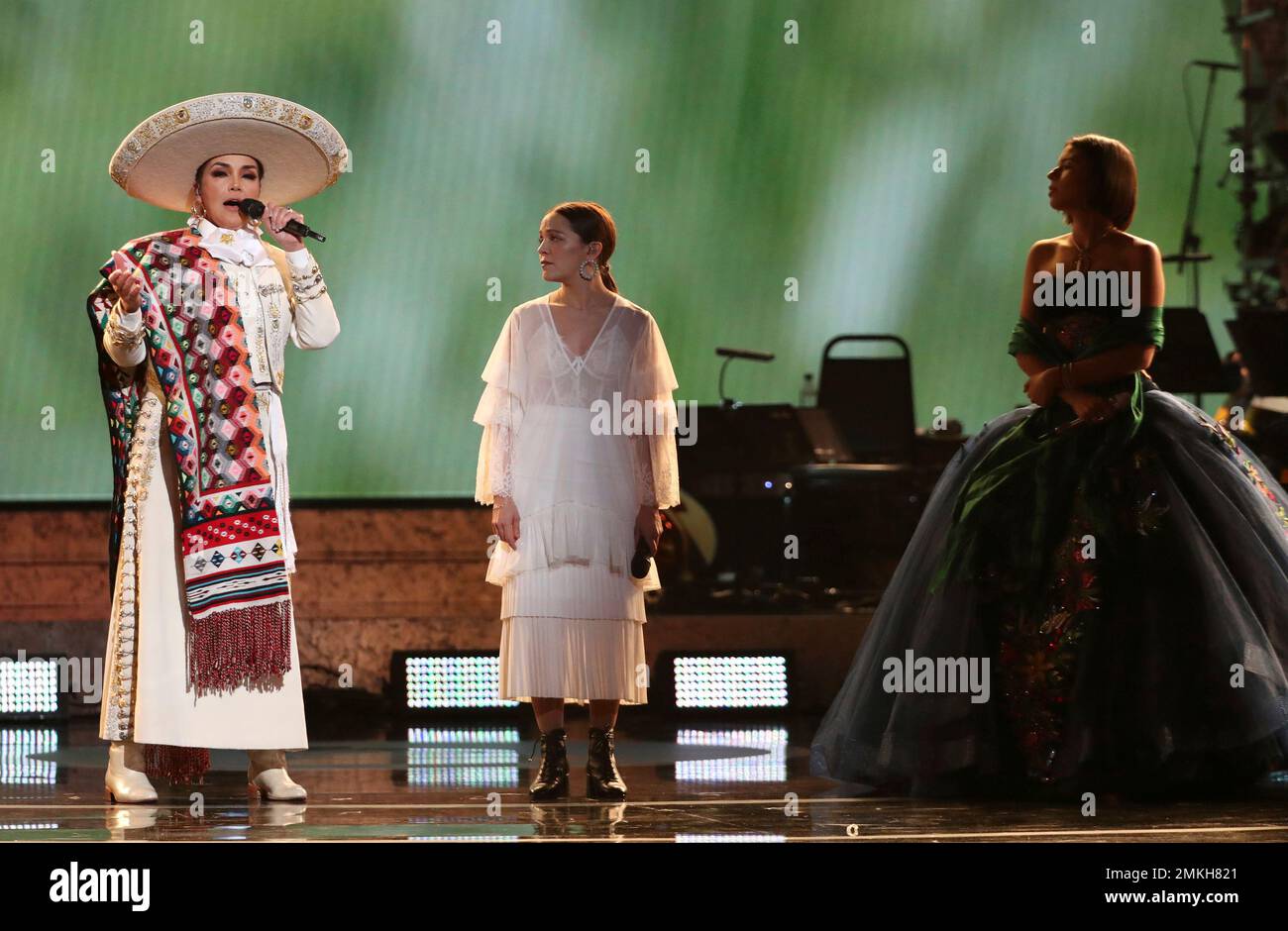 Aida Cuevas, from left, Natalia Lafourcade and Angela Aguilar perform ...