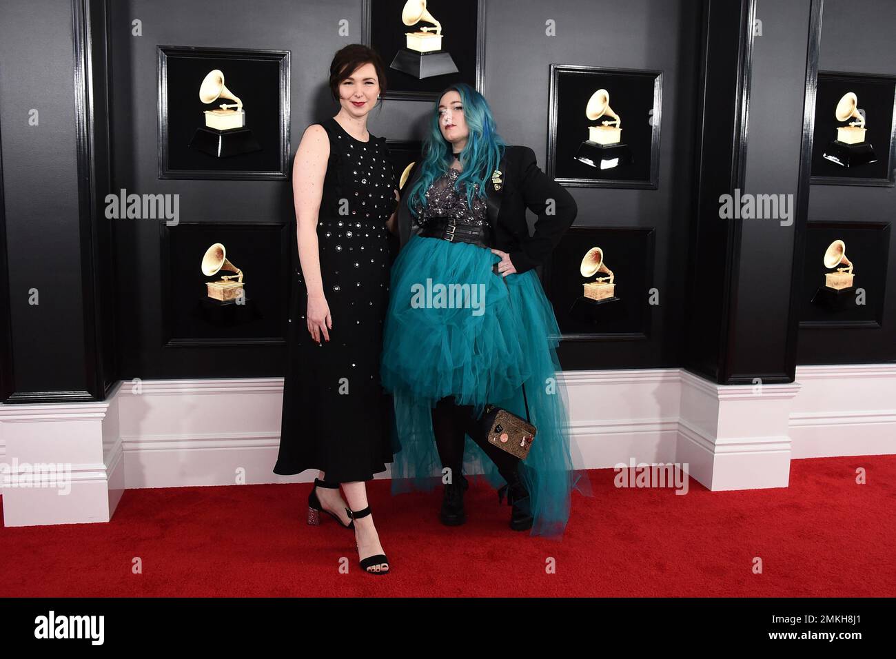 Meghan Foley, left, and Annie Stoll arrive at the 61st annual Grammy ...