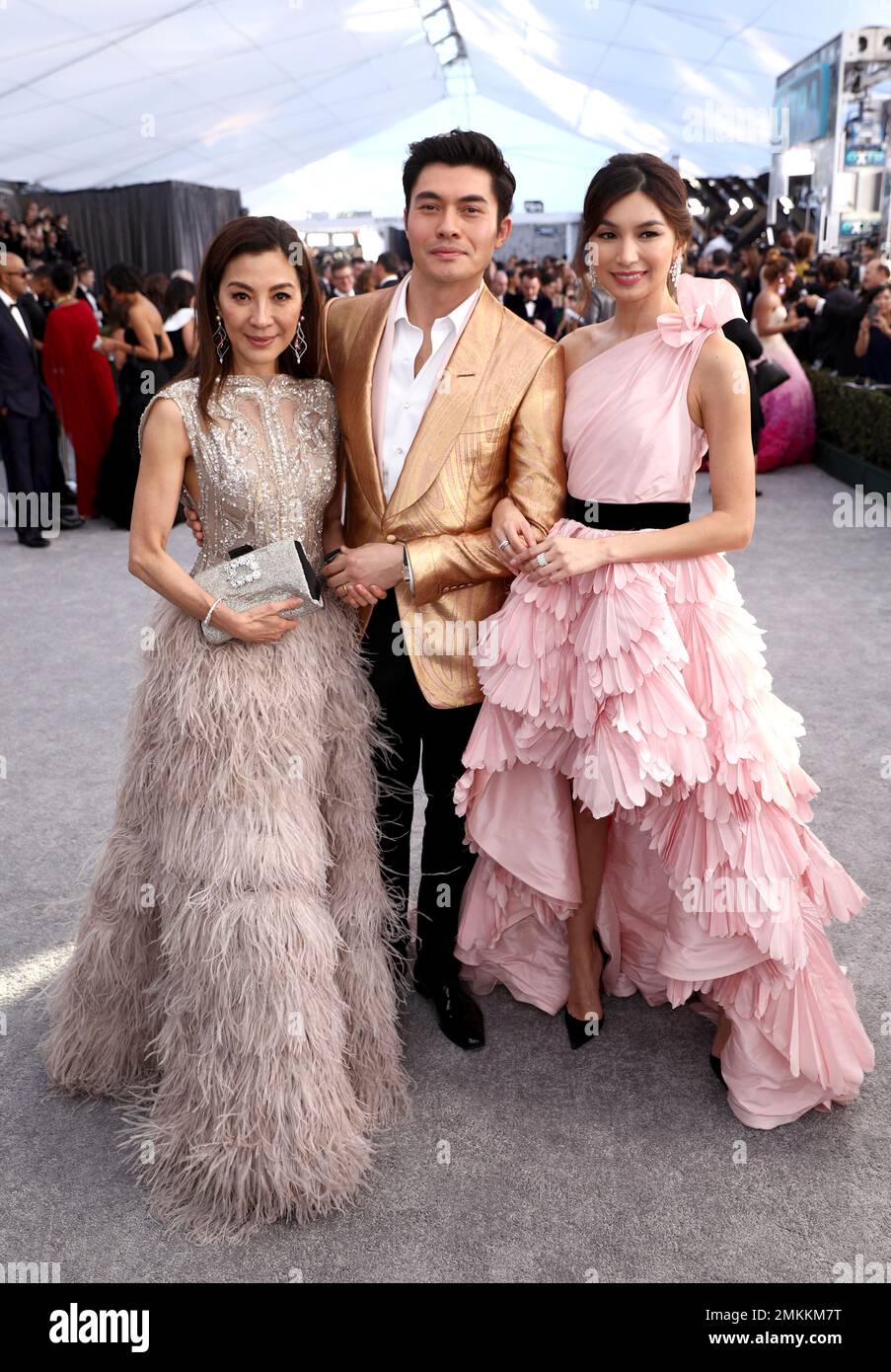 Michelle Yeoh, from left, Henry Golding and Gemma Chan arrive at the ...