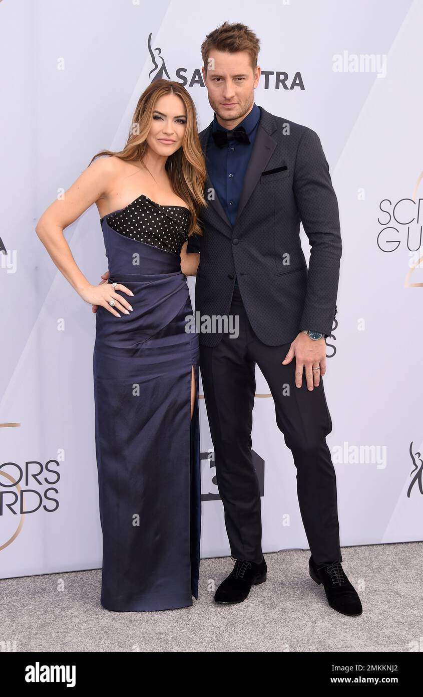 Chrishell Stause, left, and Justin Hartley arrive at the 25th annual ...
