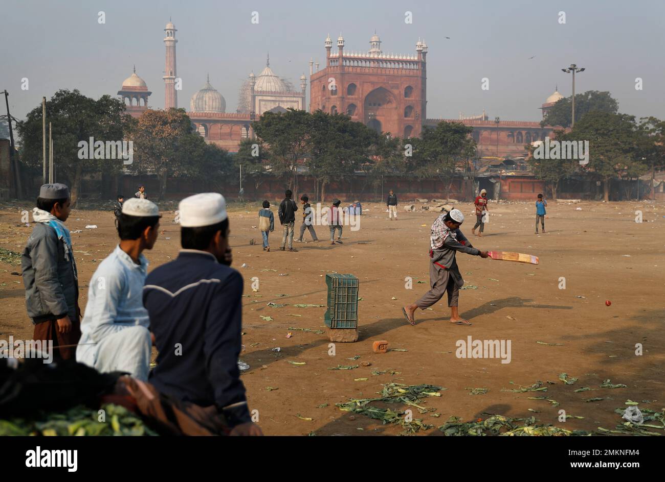 Indian Muslim boys play cricket in front of Jama Masjid mosque in the ...