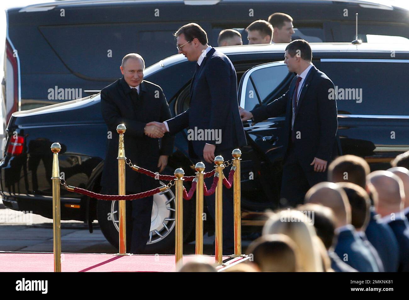 Serbian President Aleksandar Vucic, center, shakes hands with Russian ...