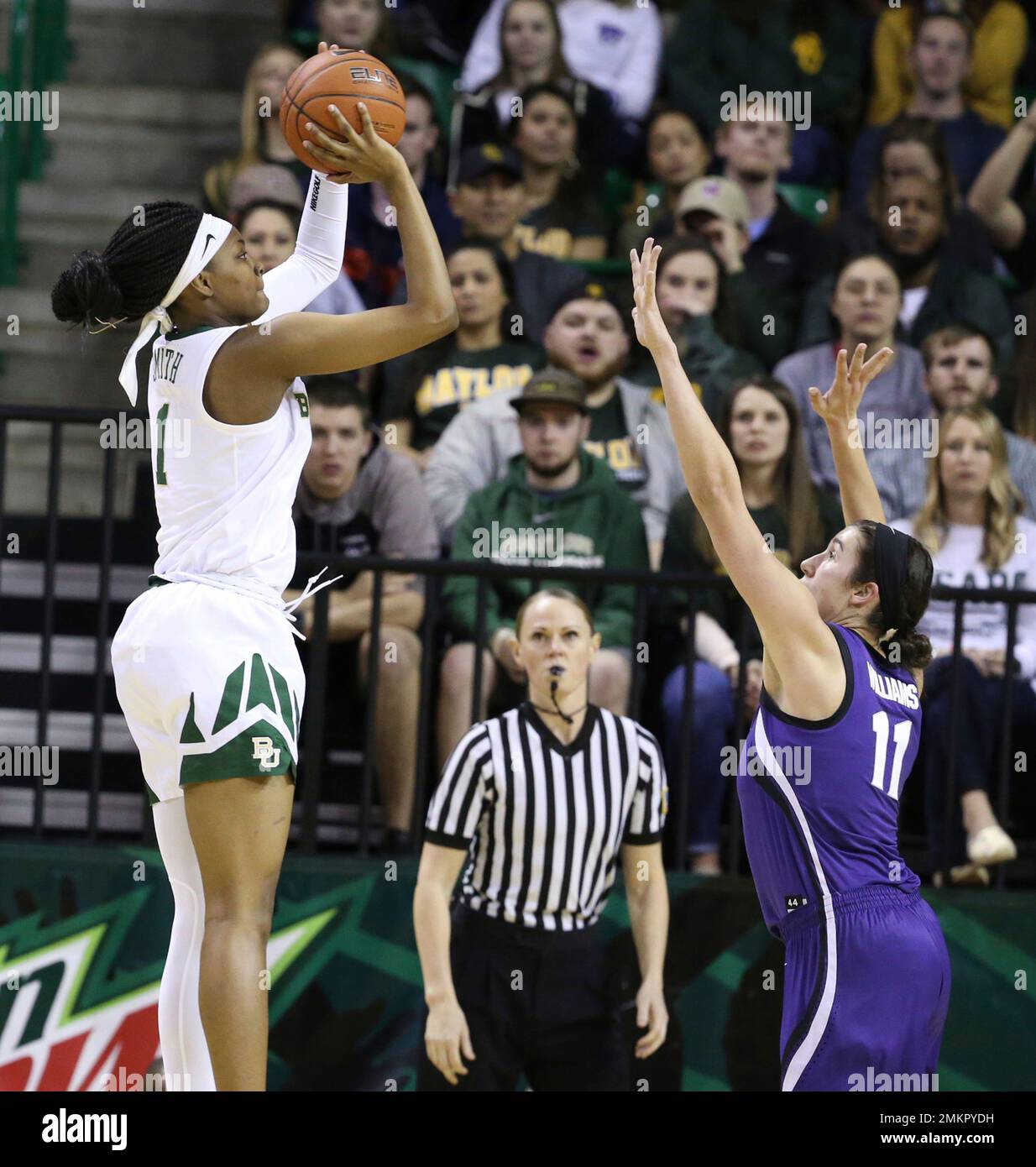 Baylor forward NaLyssa Smith, left, shoots over Kansas State forward ...