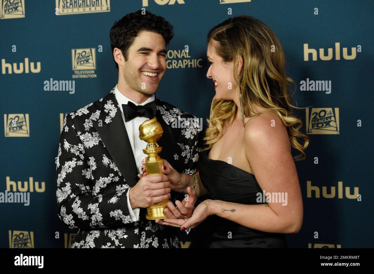 Darren Criss, left, winner of the award for best performance by an ...