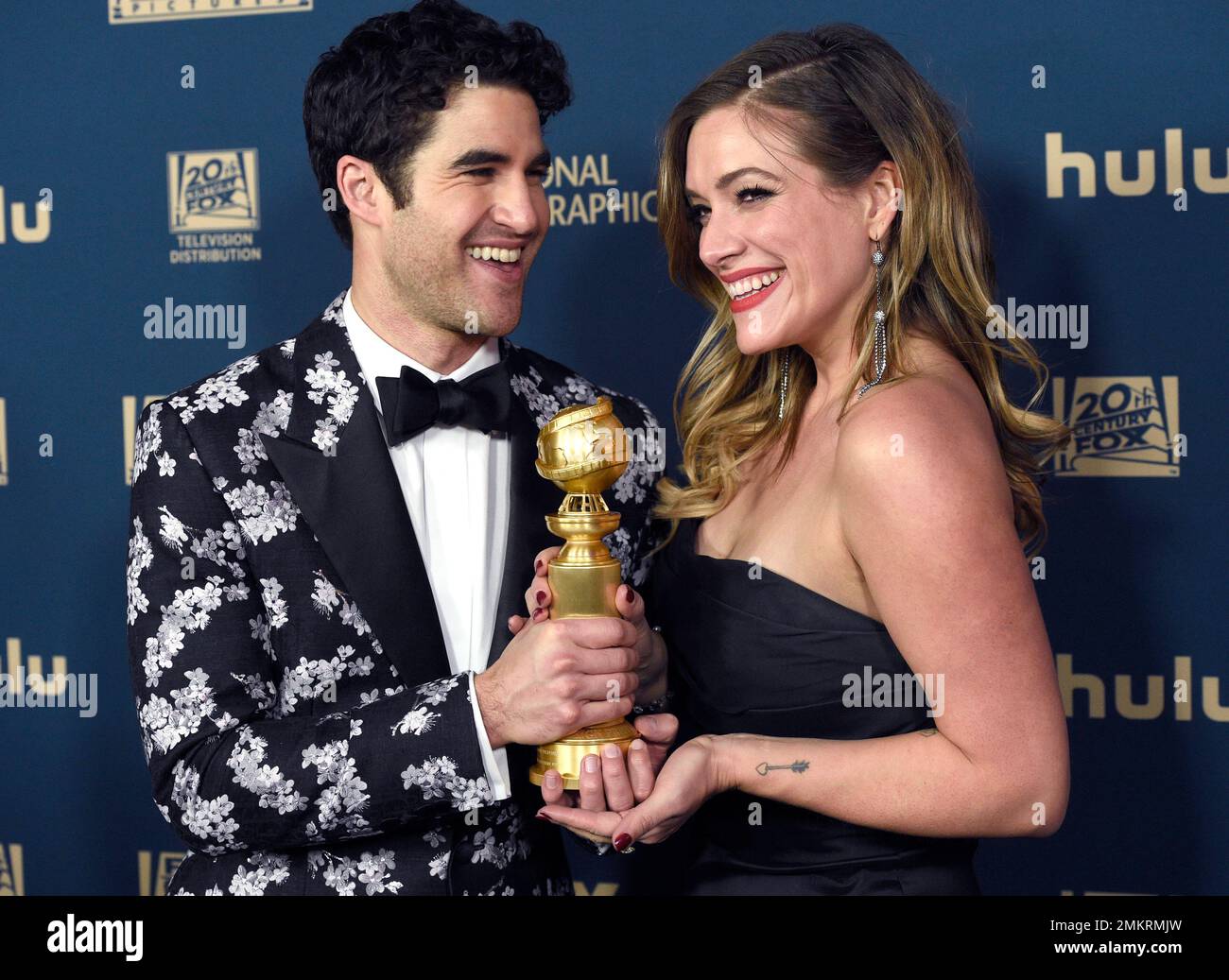 Darren Criss, left, winner of the award for best performance by an ...