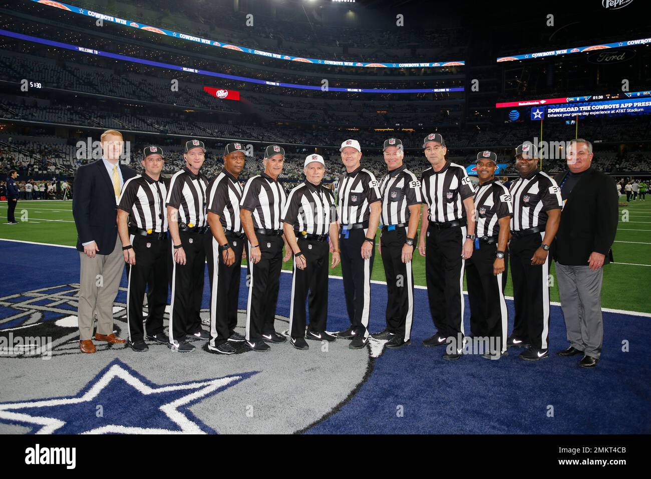 Replay Assistant Roddy Ames, from left, line judge Bart Longson (2 ...