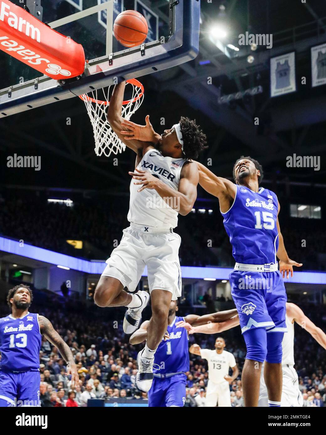 Xavier's Tyrique Jones (0) shoots next to Seton Hall's Taurean Thompson ...