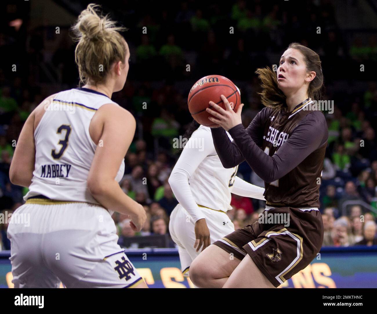 Lehigh's Mary Clougherty (44) goes up for a shot in front of Notre Dame ...