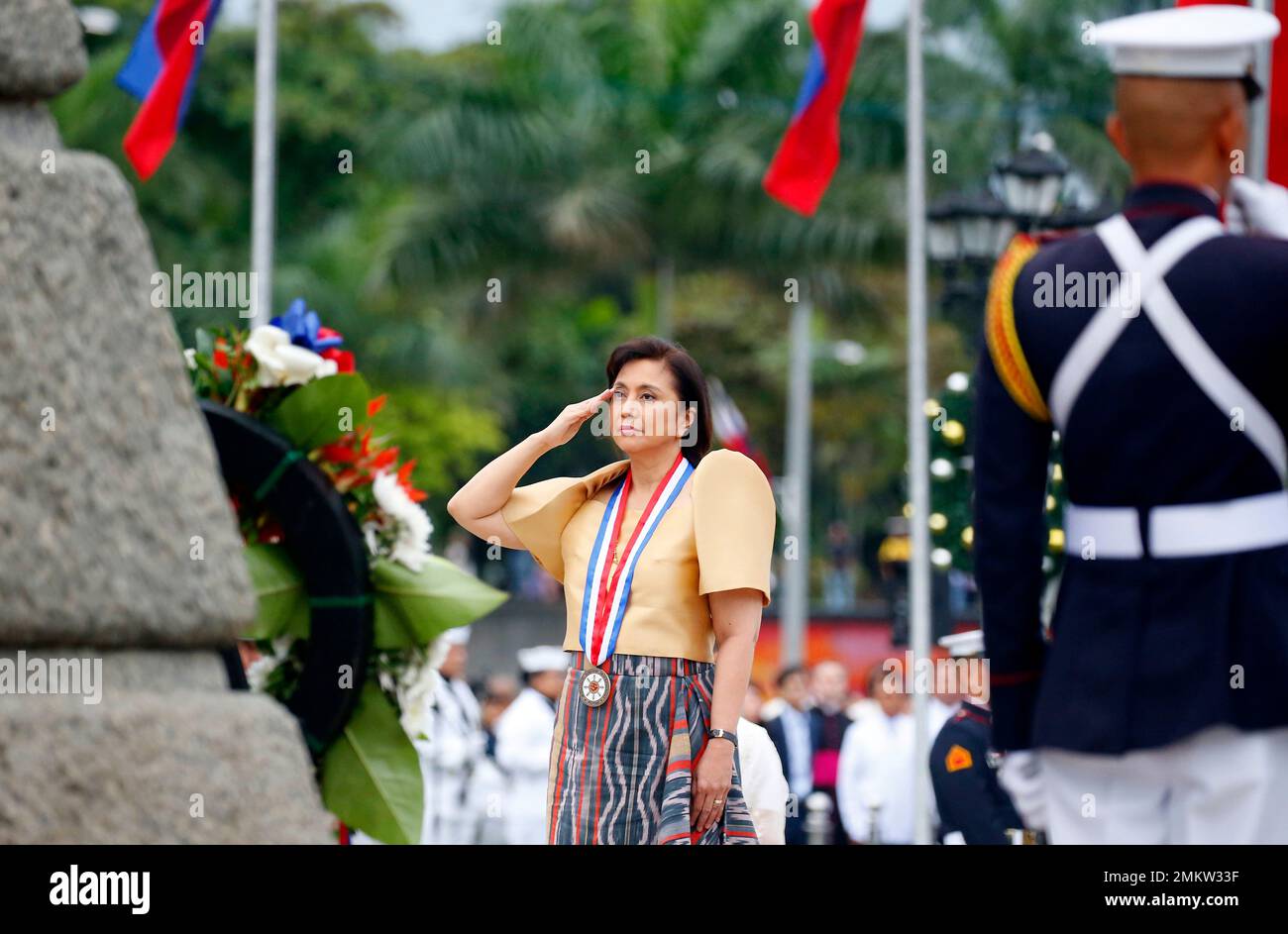 Philippine Vice President Maria Leonor "Leni" Robredo salutes after ...