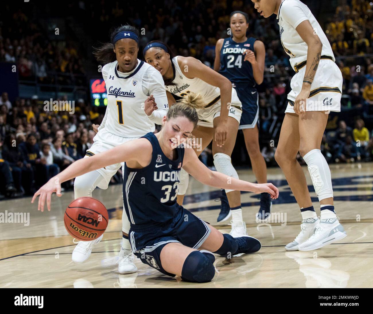 Connecticut Huskies guard/forward Katie Lou Samuelson, center, loses ...