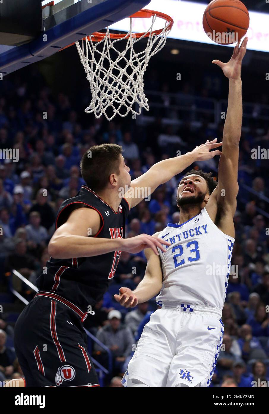 Kentucky's EJ Montgomery (23) shoots while defended by Utah's Novak ...