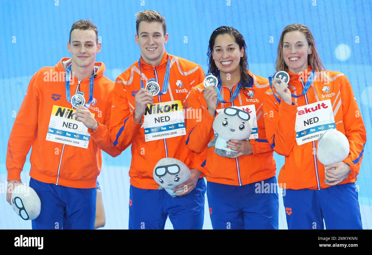 Silver medalist Netherland's, from left, Jesse Puts, Stan Pijnenburg ...