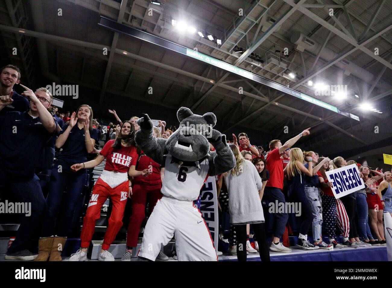 The Gonzaga mascot and fans in the student section dance during the ...