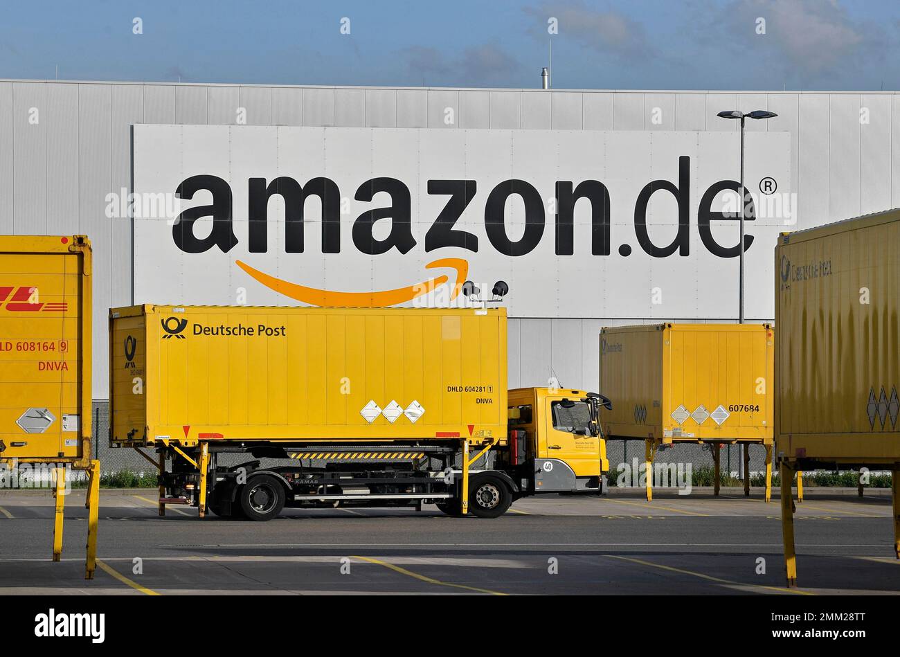 FILE - In this file photo dated Wednesday, Nov. 14, 2018, post trucks ...