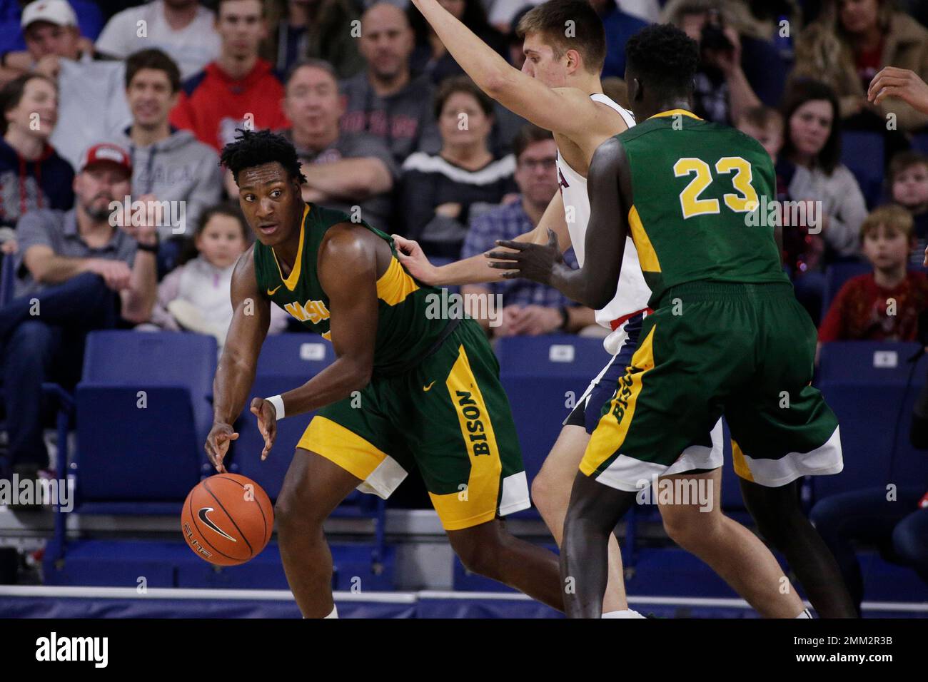 North Dakota State guard Tyree Eady, left, passes the ball to forward ...