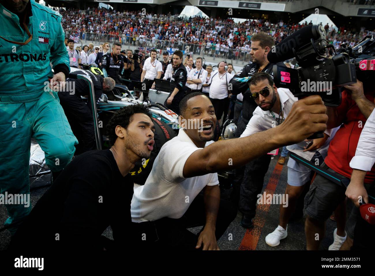 Actor Will Smith and his son Trey visit pit lane during the Emirates ...