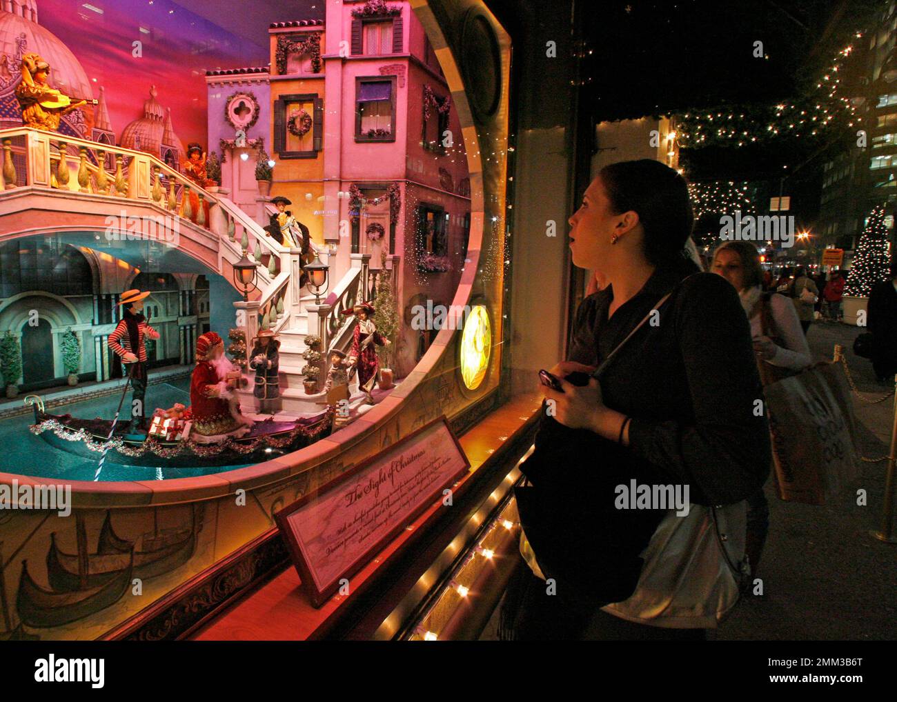FILE - In this Nov. 14, 2007 file photo, a woman pauses to view the ...