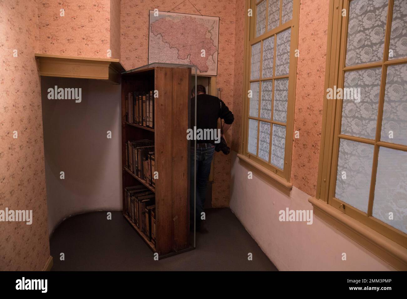 A photographer walks to the secret annex at the renovated Anne Frank ...