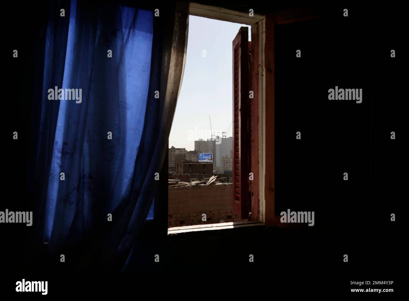 This Oct. 28, 2018 photo, the view from a bedroom window in slum area ...