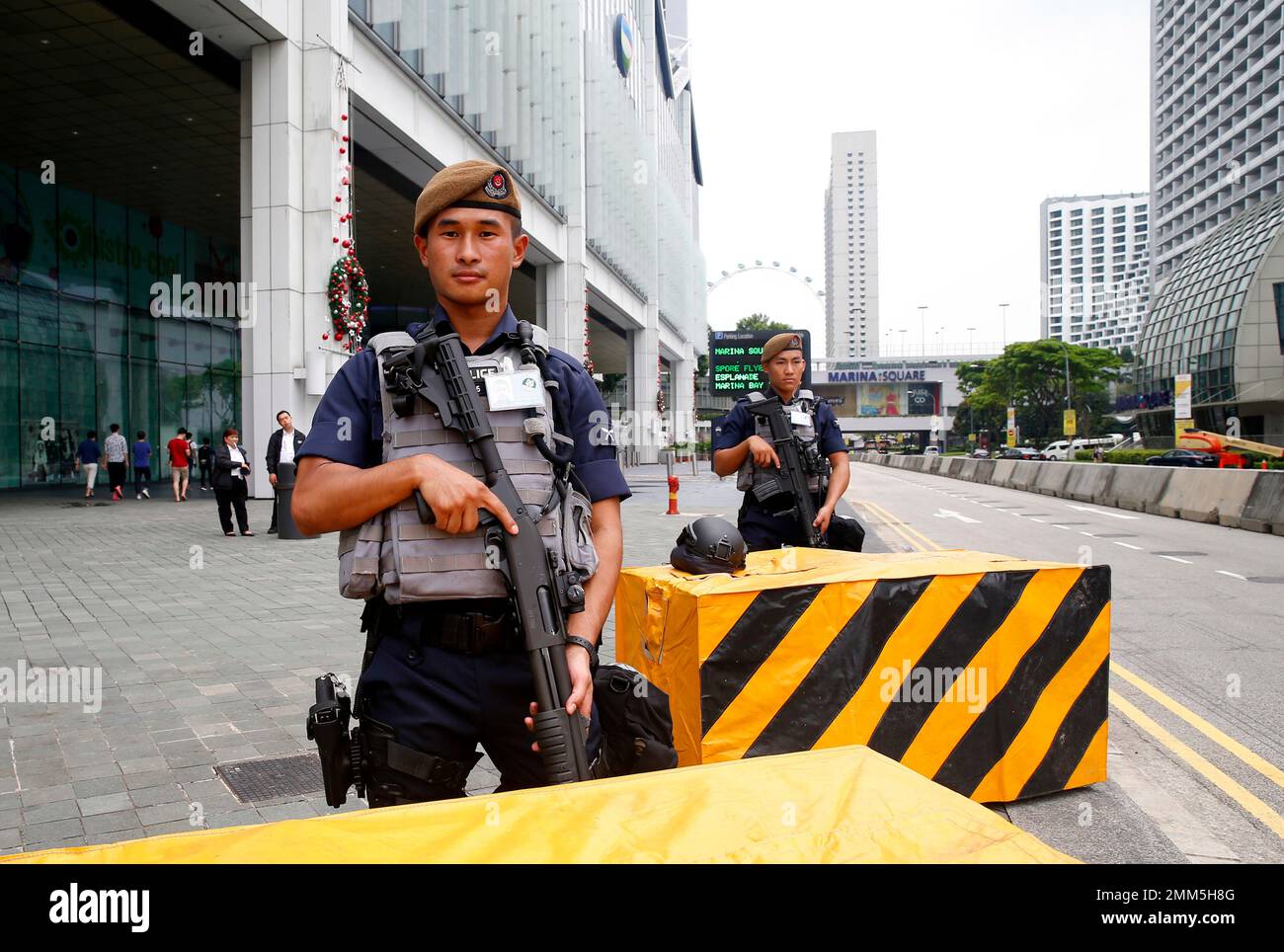 Singaporean security forces, including Gurkhas, man their position ...