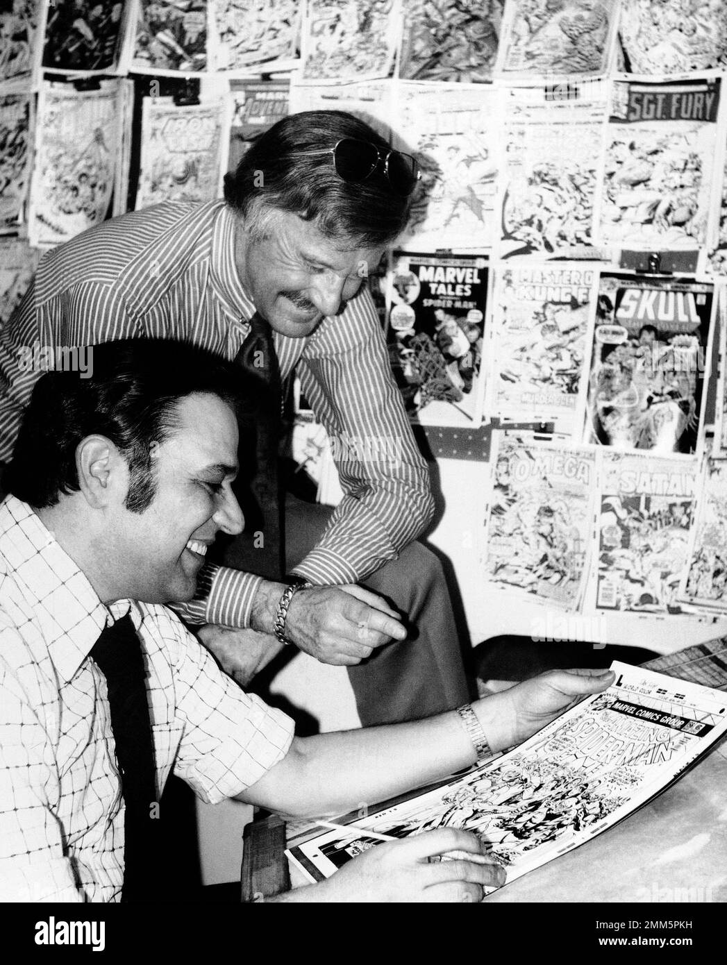 FILE - In this Jan. 10, 1976, file photo, Stan Lee, standing, publisher ...