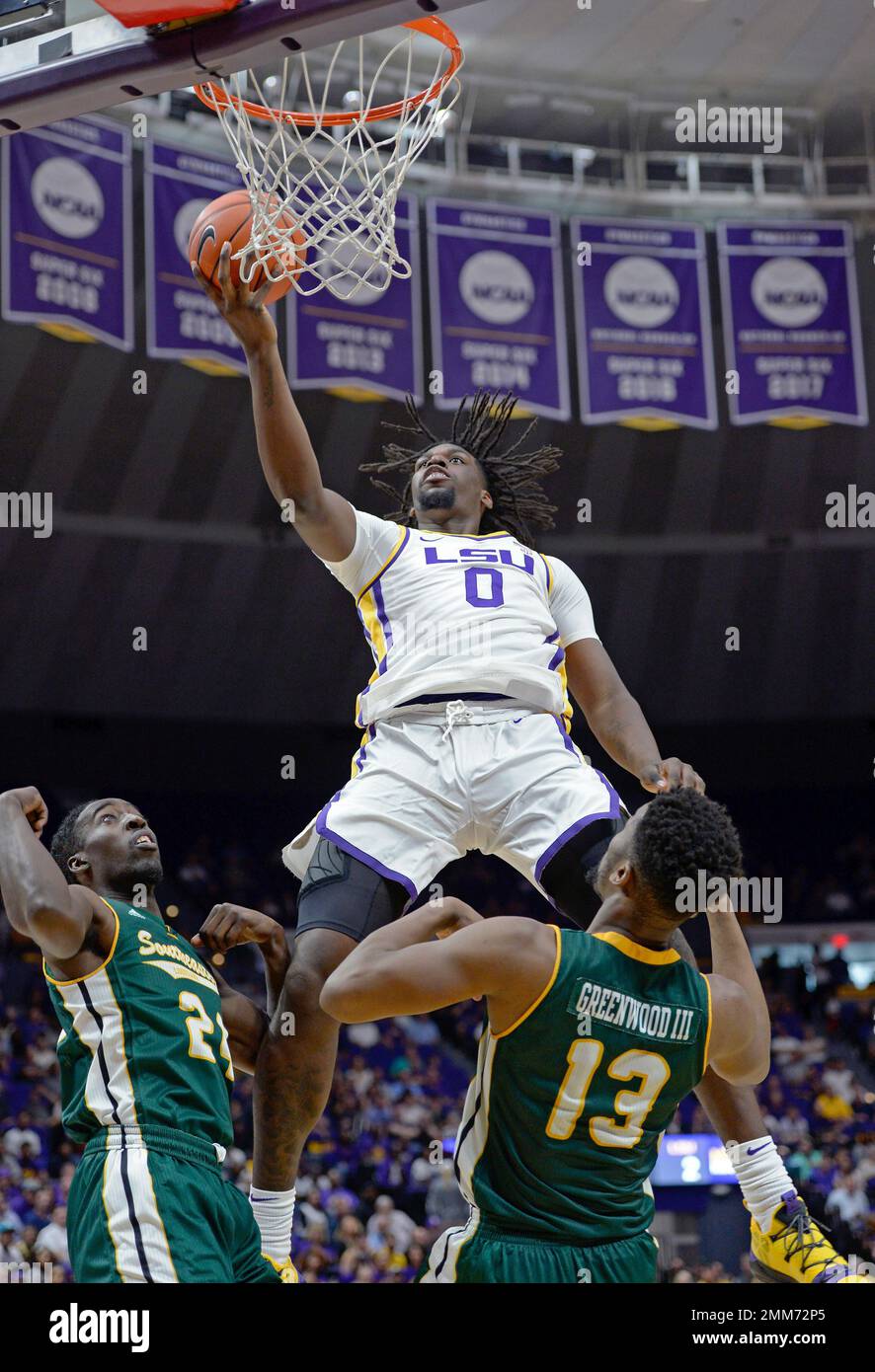 LSU forward Naz Reid (0) puts the ball up and in over Southeastern ...