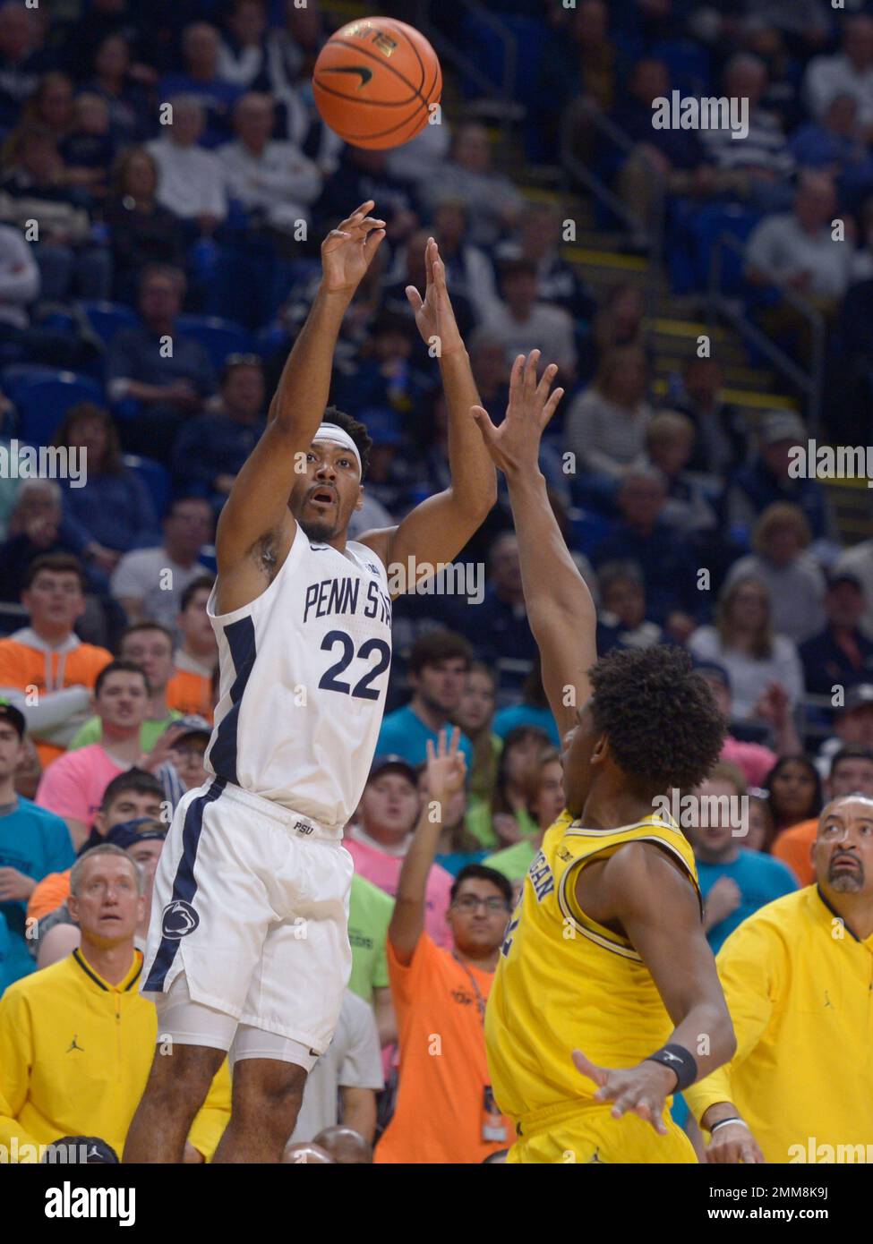 Penn State's Jalen Pickett (22) shoots over Michigan's Tarris Reed Jr ...