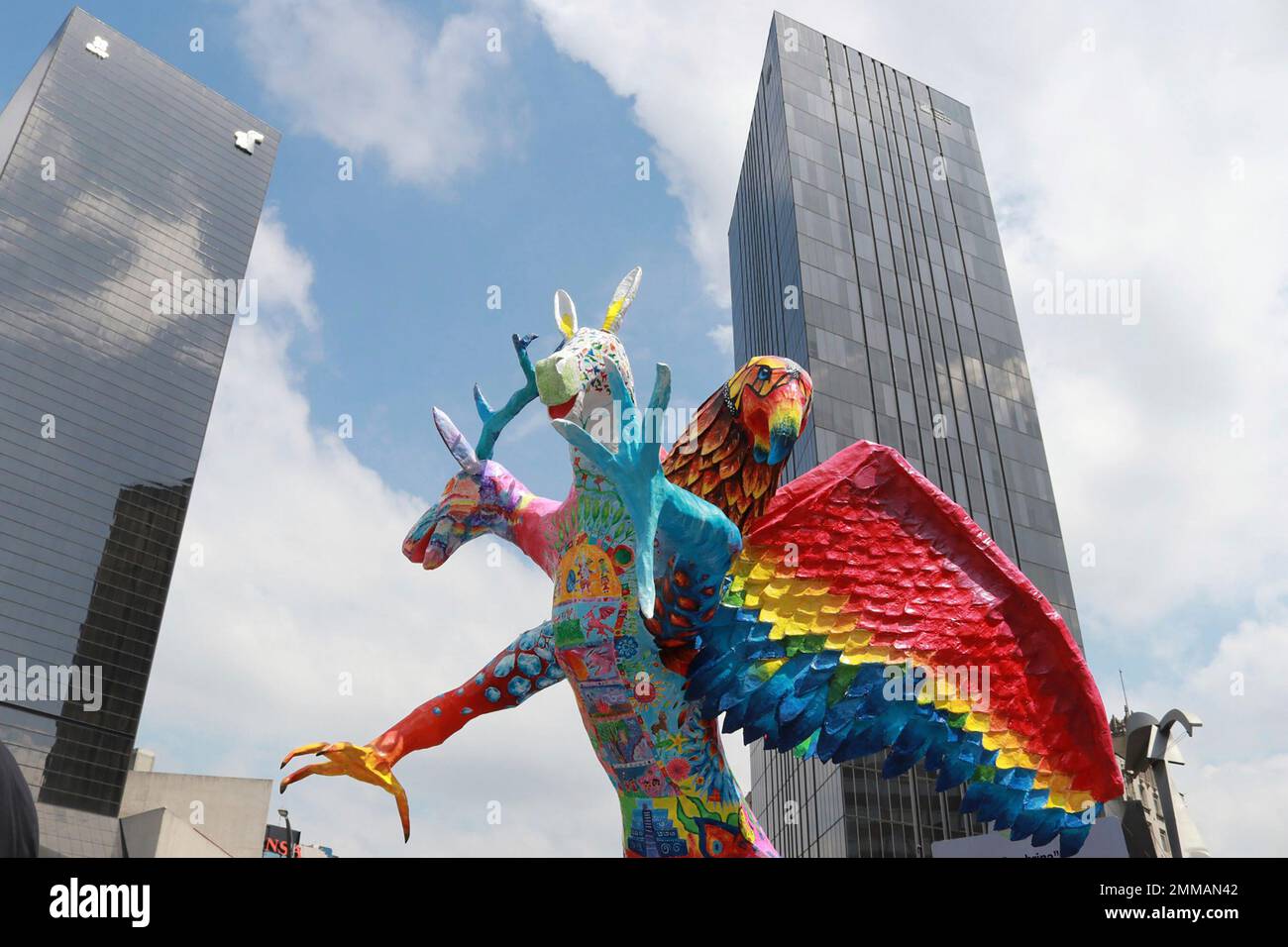 A giant alebrije is paraded through Mexico City, Saturday, Oct. 20 ...