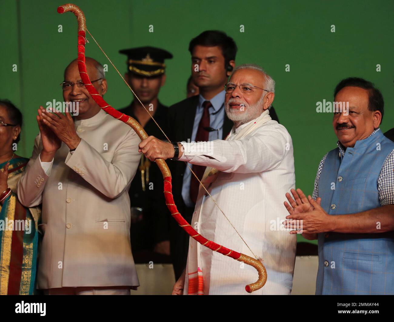 Indian Prime Minister Narendra Modi, center, symbolically releases an ...