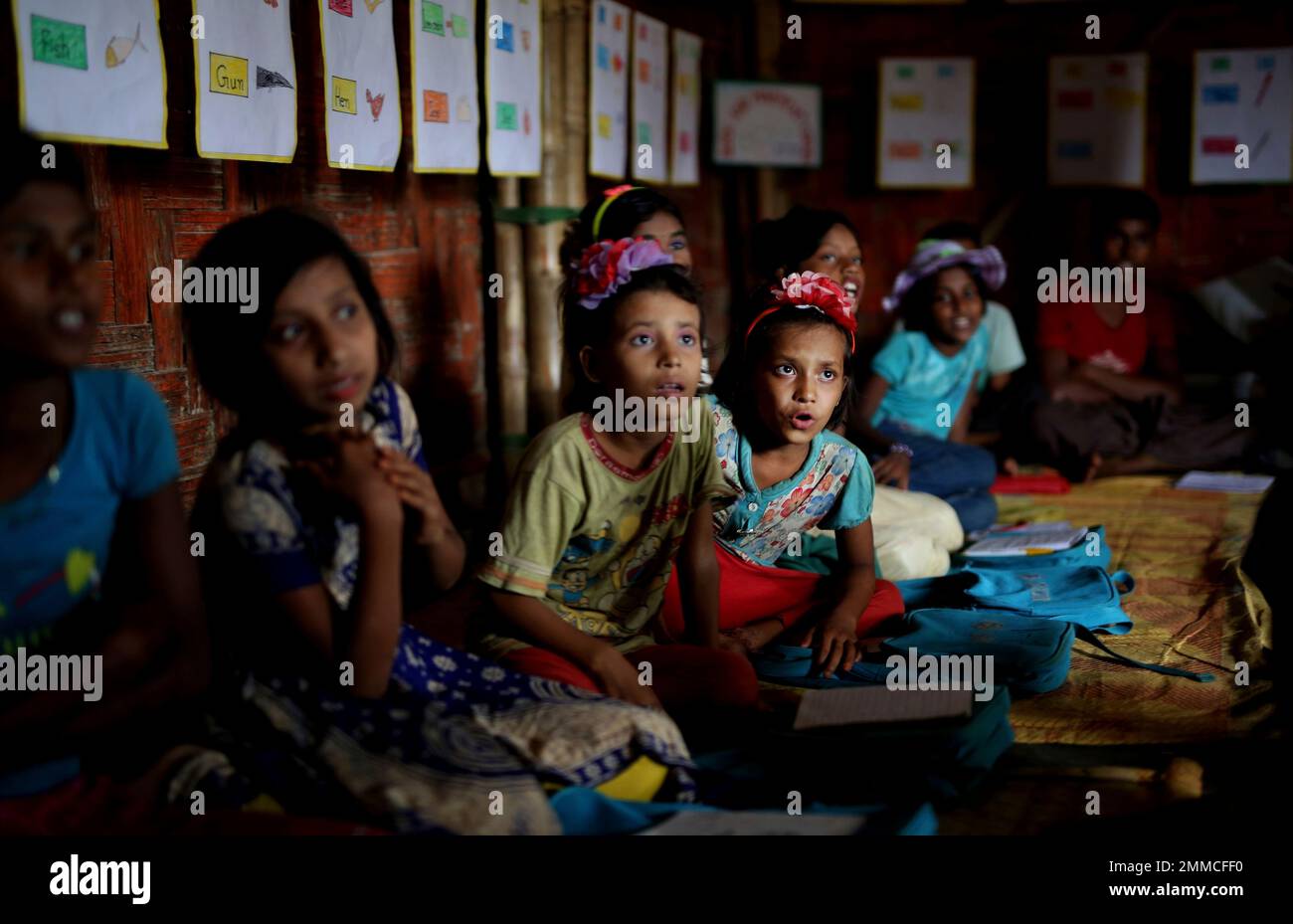 In this Aug. 27, 2018, photo, Rohingya refugee children attend a UNICEF ...