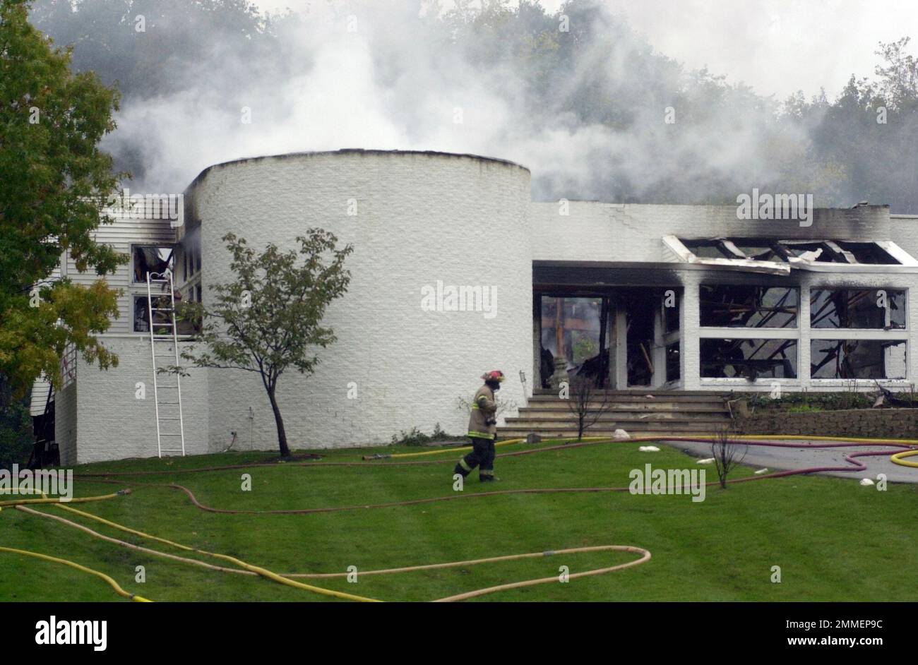 FILE- In a file photo from Oct. 25, 2002, smoke continues to rise from ...