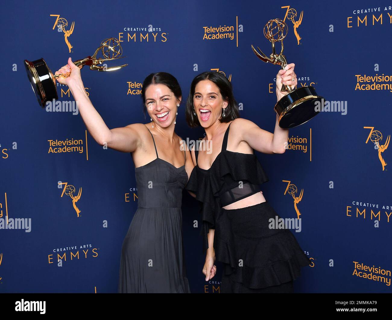 Nicole Daniels, left, and Courtney Bright, winners of the award for ...