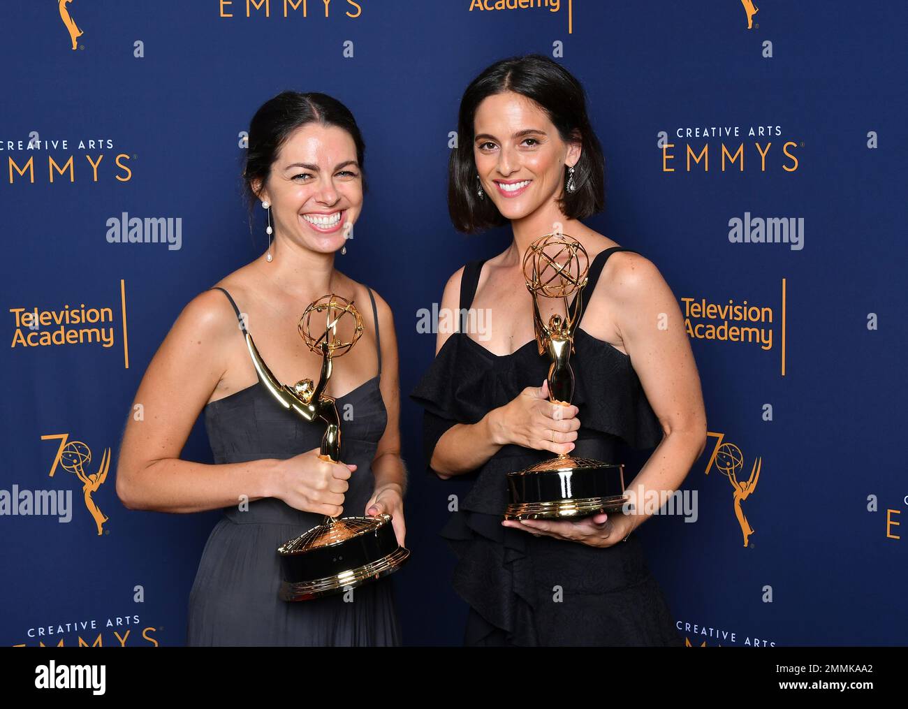 Nicole Daniels, left, and Courtney Bright, winners of the award for ...