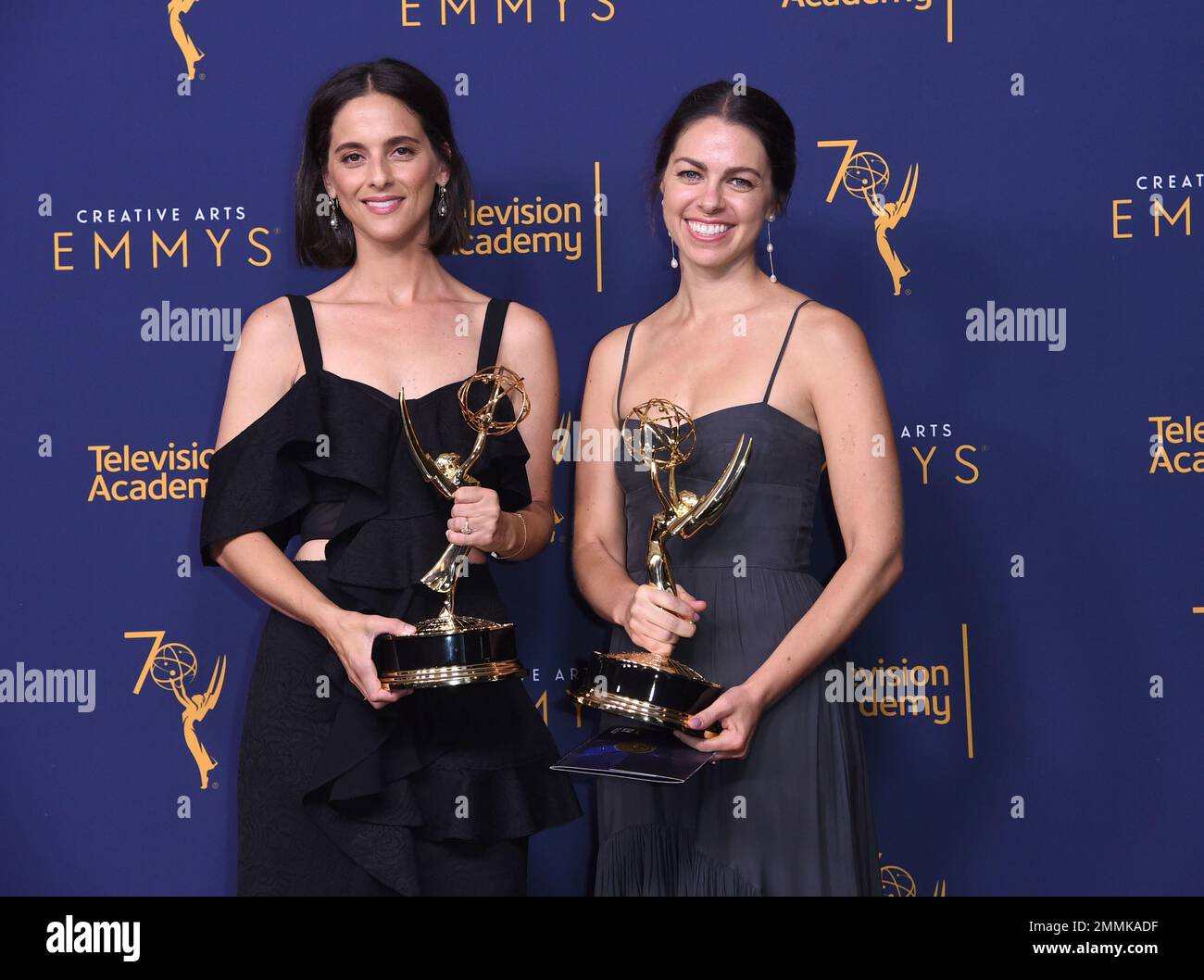 Courtney Bright, left, and Nicole Daniels, winners of the award for ...
