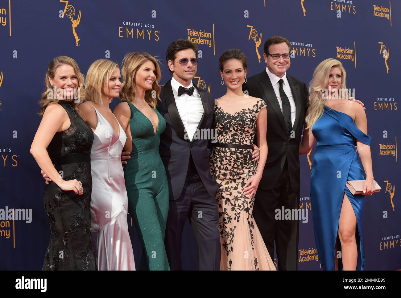 Andrea Barber, from left, Candace Cameron Bure, Lori Loughlin, John Stamos, Caitlin McHugh, Bob ...