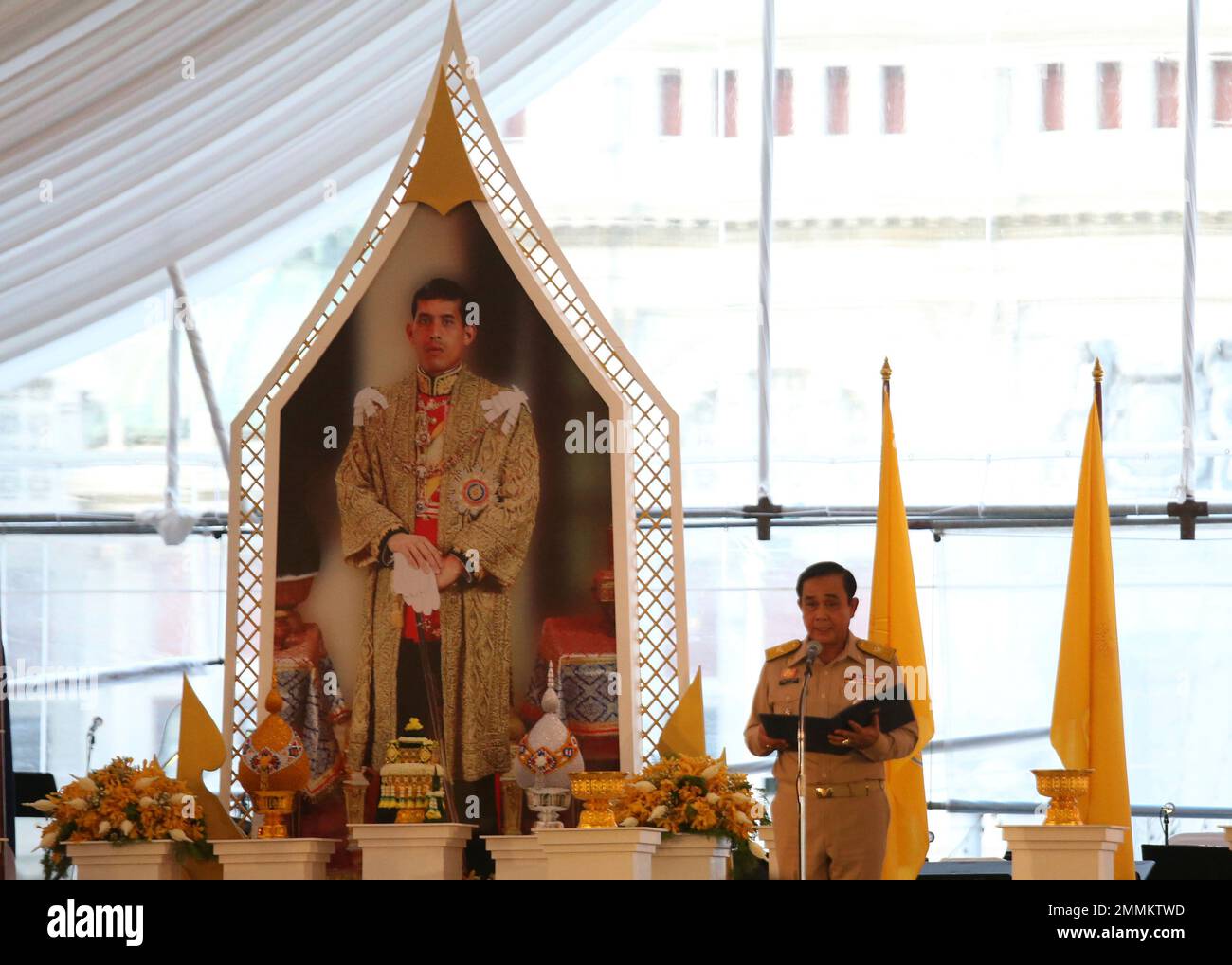 Thai Prime Minister Prayuth Chan-ocha delivers a speech in front of an ...