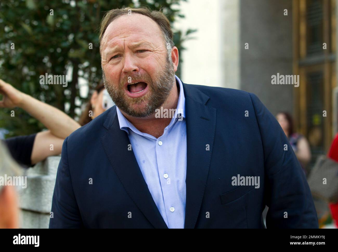 Conspiracy theorist Alex Jones speaks outside of the Dirksen building ...