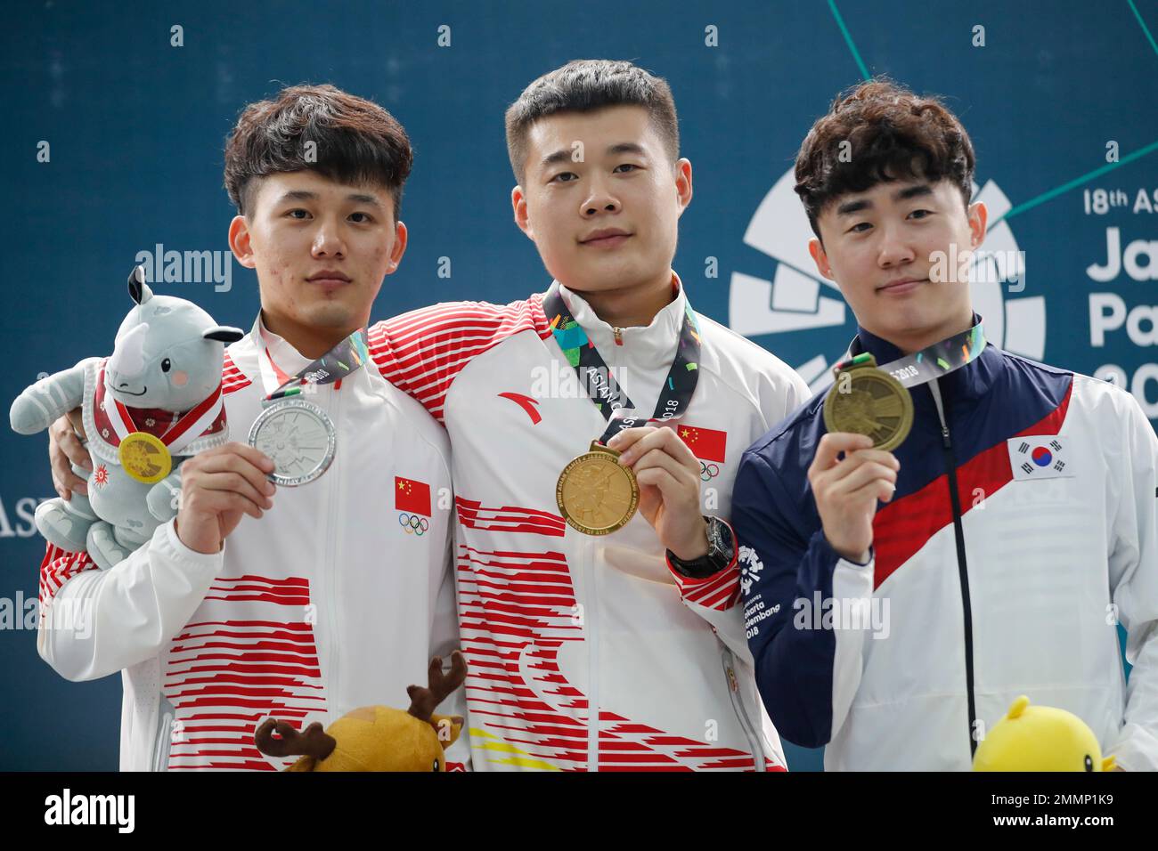From left to right, silver medalist China's Lin Junmin, gold medalist China's Yao Zhaonan, and ...