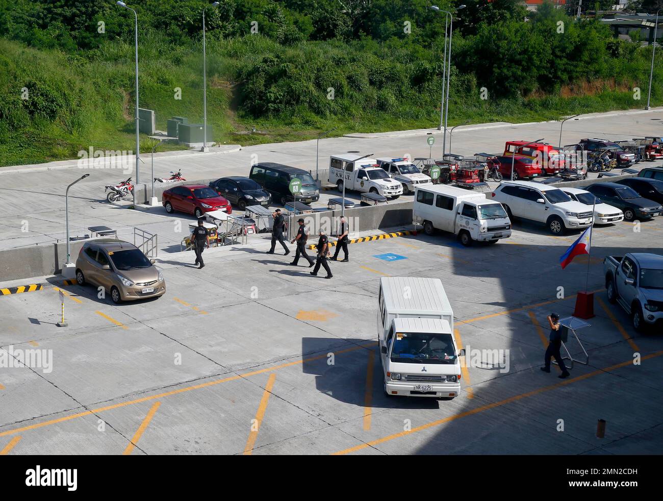 Philippine National Police SWAT members check the exact site where ...