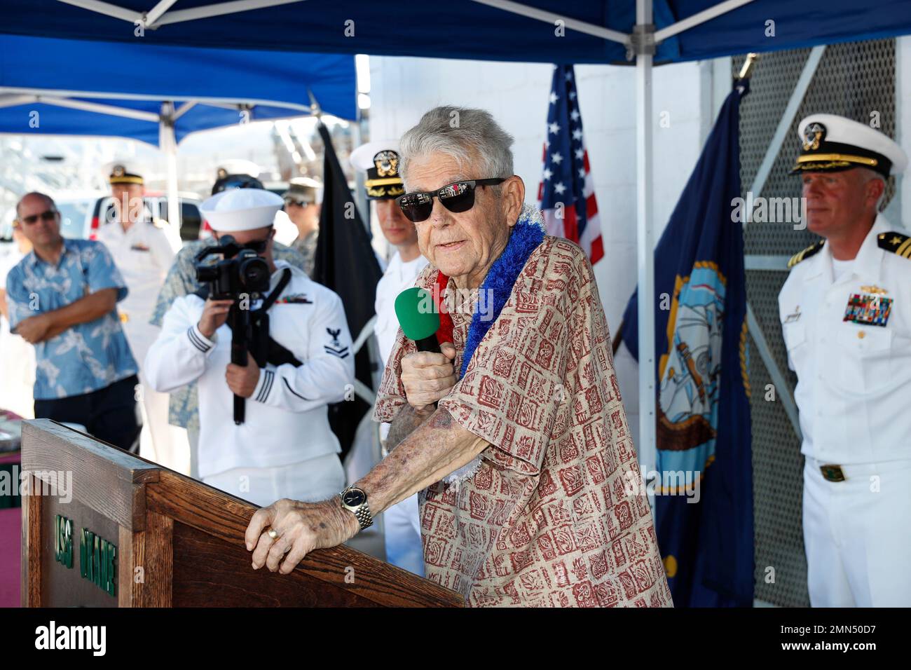 Pearl Harbor survivor Ray Emory speaks at a ceremony honoring him ...