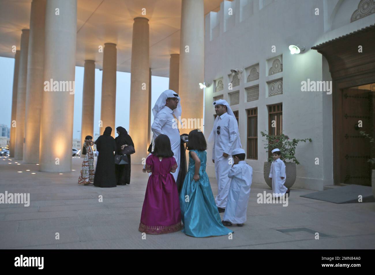 In this May 6, 2018 photo, Qatari families meet during a cultural event ...